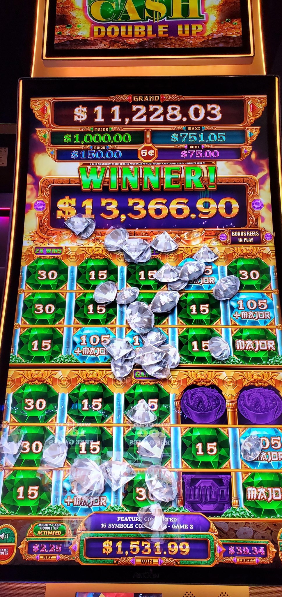 Mighty Cash Double Up Slot Machine by Aristocrat